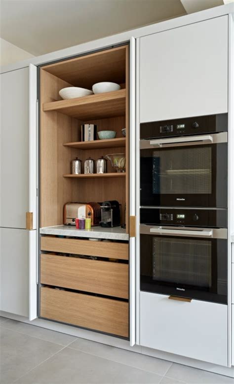 Organized Kitchen Pantry With Two Ovens
