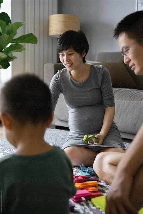 Fatherpregnant Mother And Son At Home By Stocksy Contributor Maahoo