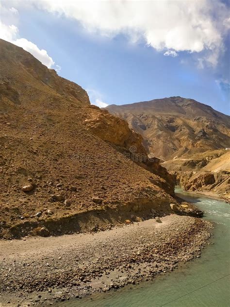 Vertical Shot Of The Indus River Running In A Valley In India Stock