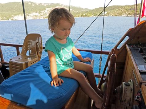 Premium Photo Girl Sitting In Boat Over Sea