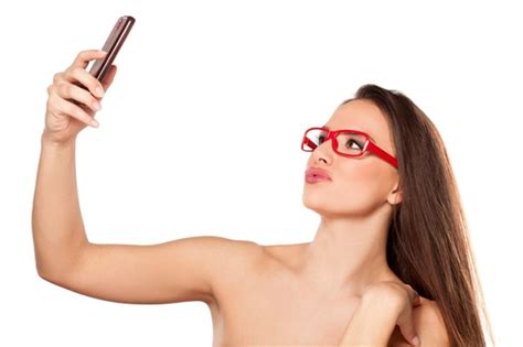 She Hits A Cop Car While Taking A Topless Selfie