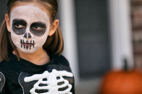 Skeleton Girl Ready To Go Trick Or Treating On Halloween By Stocksy