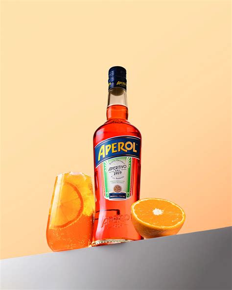 Aperol Spritz Aperitivo Bottle With Cocktail And Orange Behance
