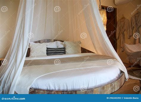 Interior Of Stylish Room With Comfortable Round Bed And Canopy Stock