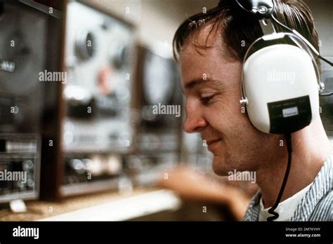 Lt Cmdr Michael Cronin Listens To A Stereo Tape Shortly After Being Released From A Prisoner