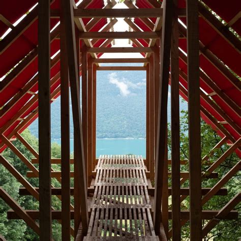 Oversized Red Roof Shelters Patagonian Shadow Cabin In France
