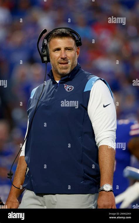 Tennessee Titans Head Coach Mike Vrabel Stands On Field During An Nfl