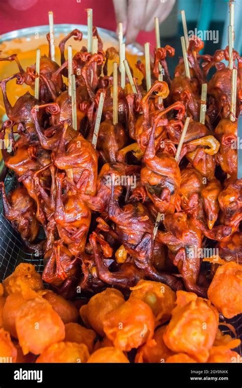 Filipino Street Food Skewered Deep Fried One Day Old Chicks Stock