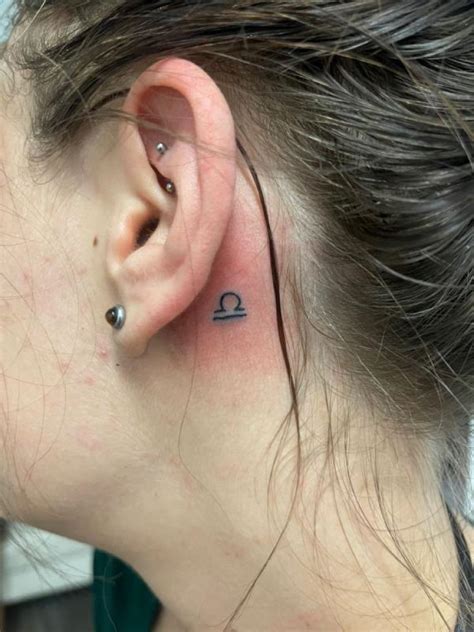 Om Tattoo Behind Ear