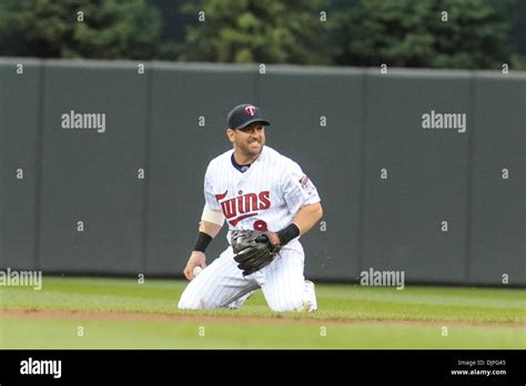 Minnesota Twins Third Baseman Nick Punto 8 Fields The Ball Holding Kansas City Royals Third