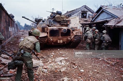 Philips Us Marines Take Cover Behind An M48a3 Patton Tank In The