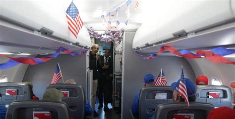President Obama Surprises Plane Full Of Veterans Arriving In Washington