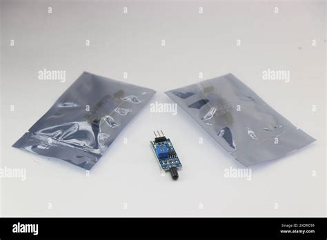 Flame Sensor Or Infrared Receiver Module With Sealed Pack On The Background Isolated On White