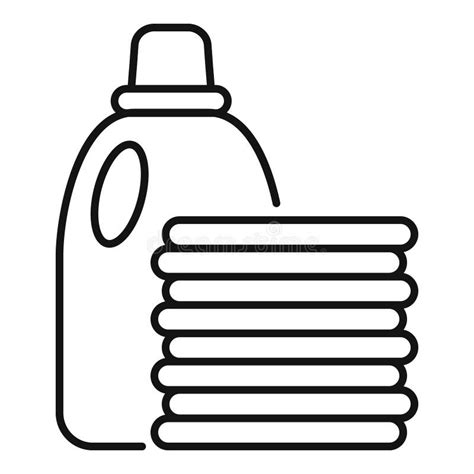 Laundry Detergent Standing Next To A Stack Of Clean Clothes Stock