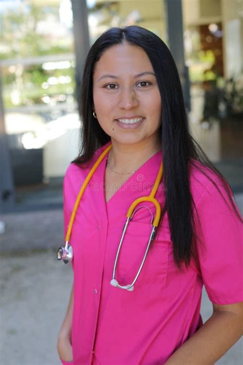 Attractive Female Hispanic Doctor Or Nurse Isolated Stock Image Image