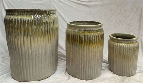 Set Of 3 Glazed Ceramic Pots With Elegant Ribbed Design Yellow And