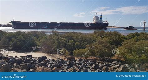 Iron Ore Ship Being Escorted Into Port Hedland Harbor Western Australia