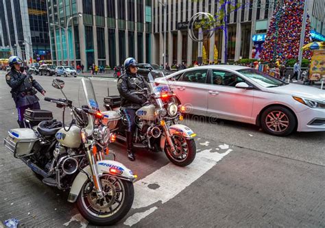 Nypd Highway Patrol Officers On Motorcycles Providing Security In