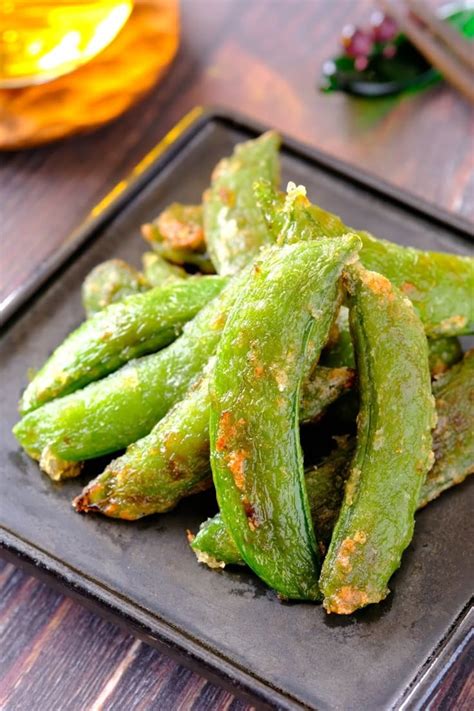無限のスナップえんどうレシピ 美味しい家庭料理 サクサク野菜の前菜 ベジタリアンの前菜アイデア 皿の上の揚げたインゲン豆