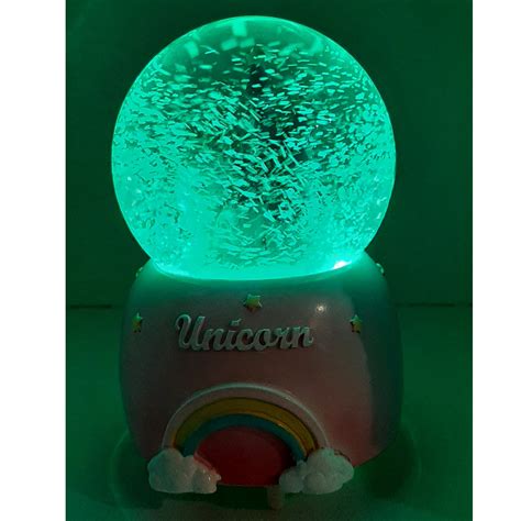 قیمت و خرید گوی موزیکال مدل پمپی طرح یونیکورن و قصر روی ابر