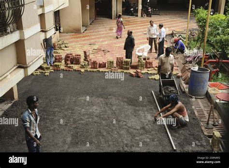 Installation Of Interlocking Paver Block Bricks India Asia Stock