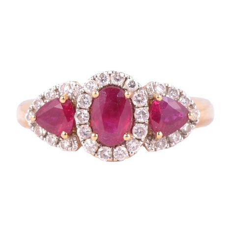 Lot 34 A Ruby And Diamond Cluster Ring