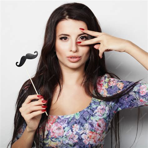 Premium Photo Young Woman Wearing Fake Mustache