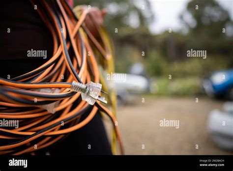Extension Cord Wrapped Up On The Ground Extension Lead Power Lead On
