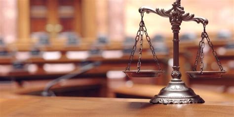 The Symbol Of Justice Scales Representing Fairness In A Courtroom