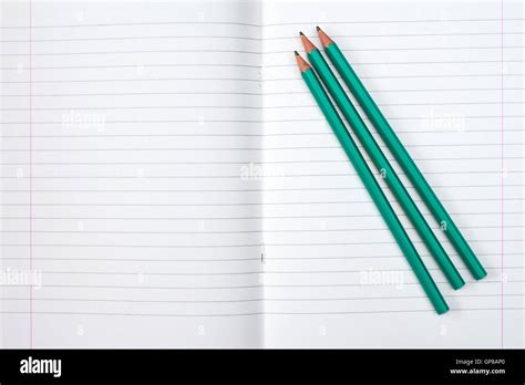Lined Exercise Book And Three Pencils Back To School Concept Stock