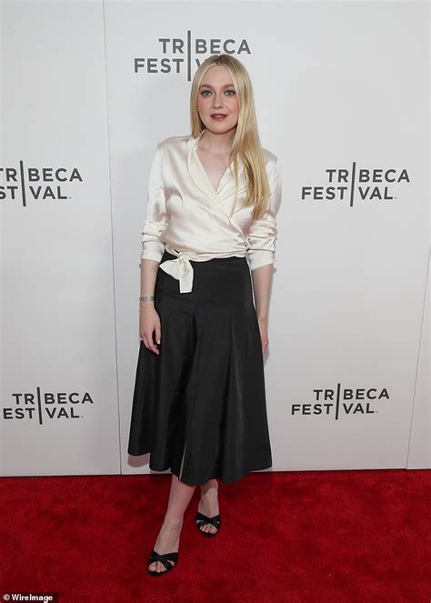 Dakota Fanning Stuns In A White Top And Black Midi Skirt For Premiere