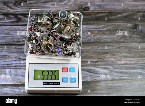 Pile Stack Of Silver On A Digital Accurate Scale In Grams Bracelets Rings And Silver Chains