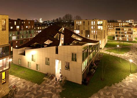 Terraces Are Carved From The Green Roof Of Nl Architects Funen Blok K