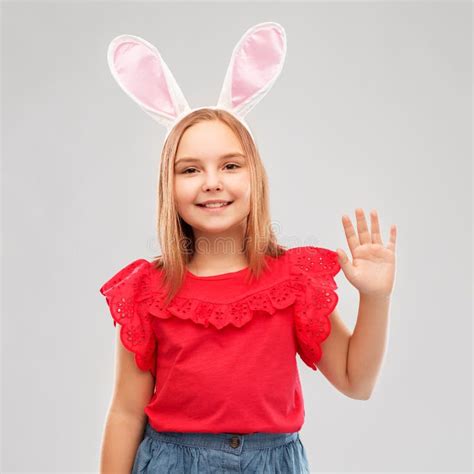 Happy Girl Wearing Easter Bunny Ears Waving Hand Stock Image Image Of