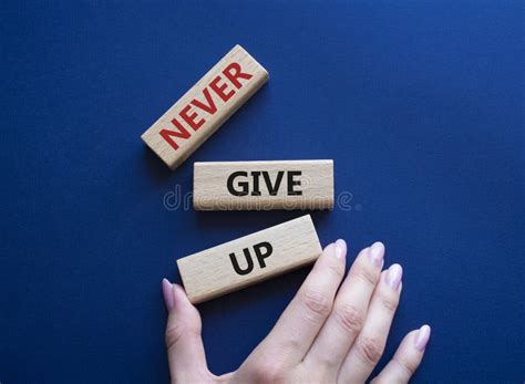 Never Give Up Symbol Concept Words Never Give Up On Wooden Blocks