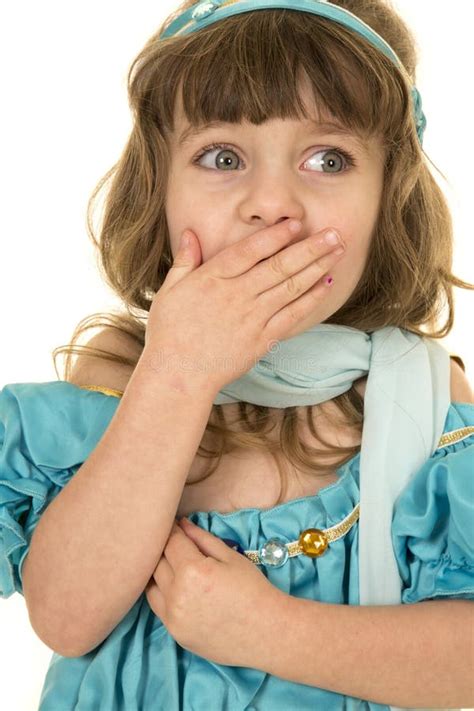 Young Girl In A Blue Top And Scarf Hand Over Mouth Stock Image Image