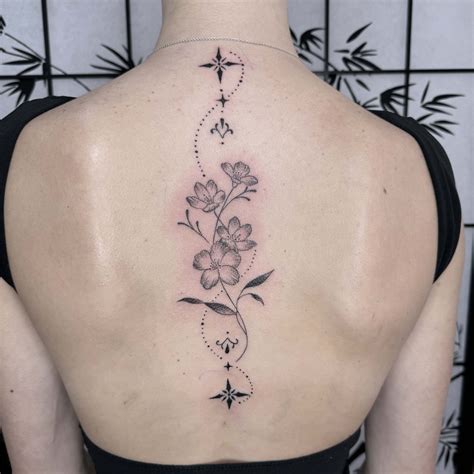 23 Stunning Spine Tattoos Thatll Take Your Breath Away Happy Muncher