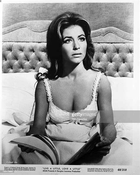 Michelle Carey Sitting Up In Bed In A Scene From The Film Live A