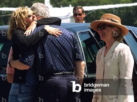 Image Of President Clinton Says Goodbye To Steven Spielbergs Wife