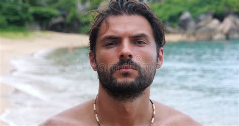 Attractive Young Dark Haired Man Bearded Macho Staring To The Camera