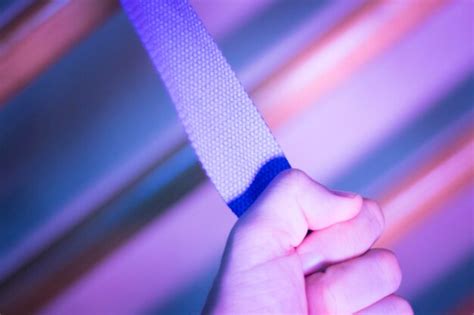 Premium Photo Cropped Hand Holding Strap In Gym