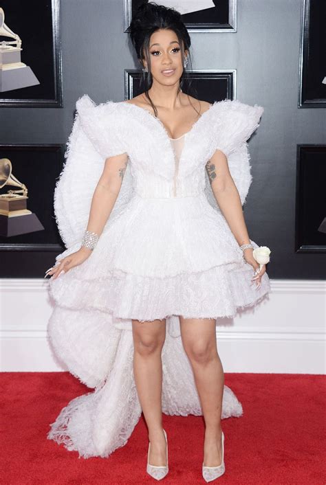 Cardi B Dresses Up In A Theatrical Dress For The 2018 Grammy Awards