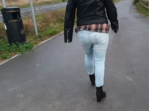 Public Wetting And Rewetting Tight Blue Jeans And Leather Jacket