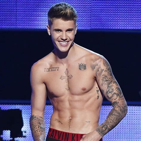 Justin Bieber Tattoo Guide And Meanings From New Face Tattoo To That
