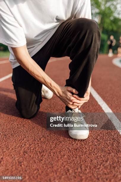 Man Kneeling On One Knee Photos And Premium High Res Pictures Getty