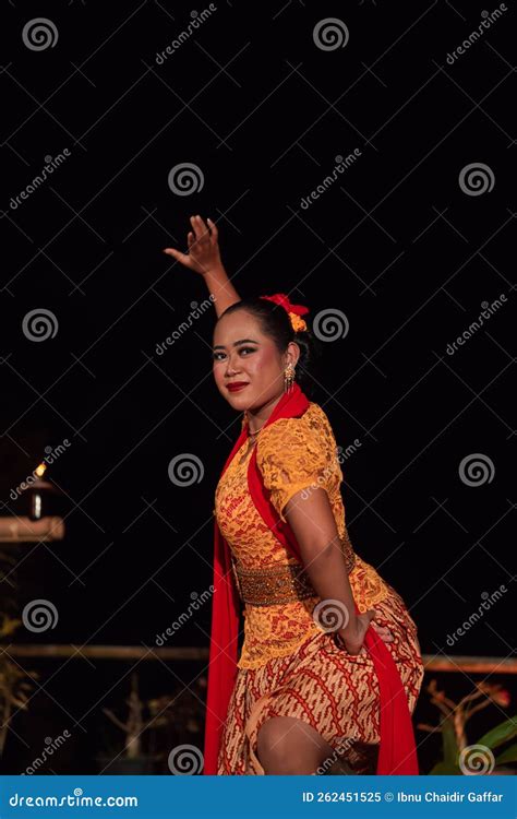 Asian Woman Performing A Traditional Dance Called Jaipong In Indonesia