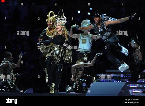 Madonna Performs During The Halftime Show At Super Bowl Xlvi Between The New York Giants And The