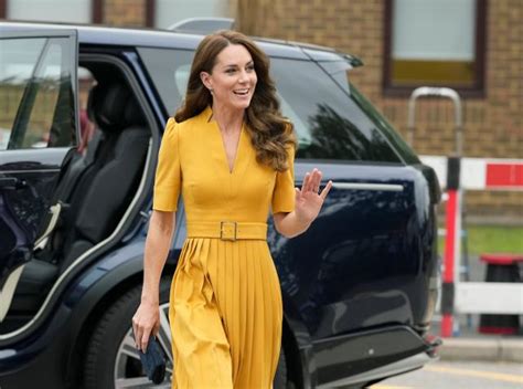 Kate Middleton Steps Out In Sunny Yellow Dress