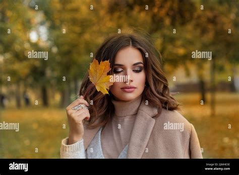 Atumn Woman Portrait Beautiful Model Holds Fall Maple Leaves Outdoor