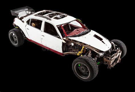 Detailed View Of An Incomplete Race Car Chassis With Open Body Panels And Exposed Components